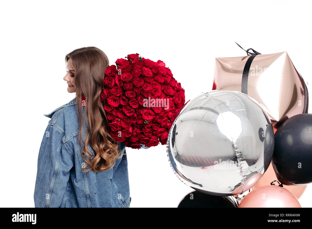 Brunette girl with long hair getting presents on birthday Stock Photo ...