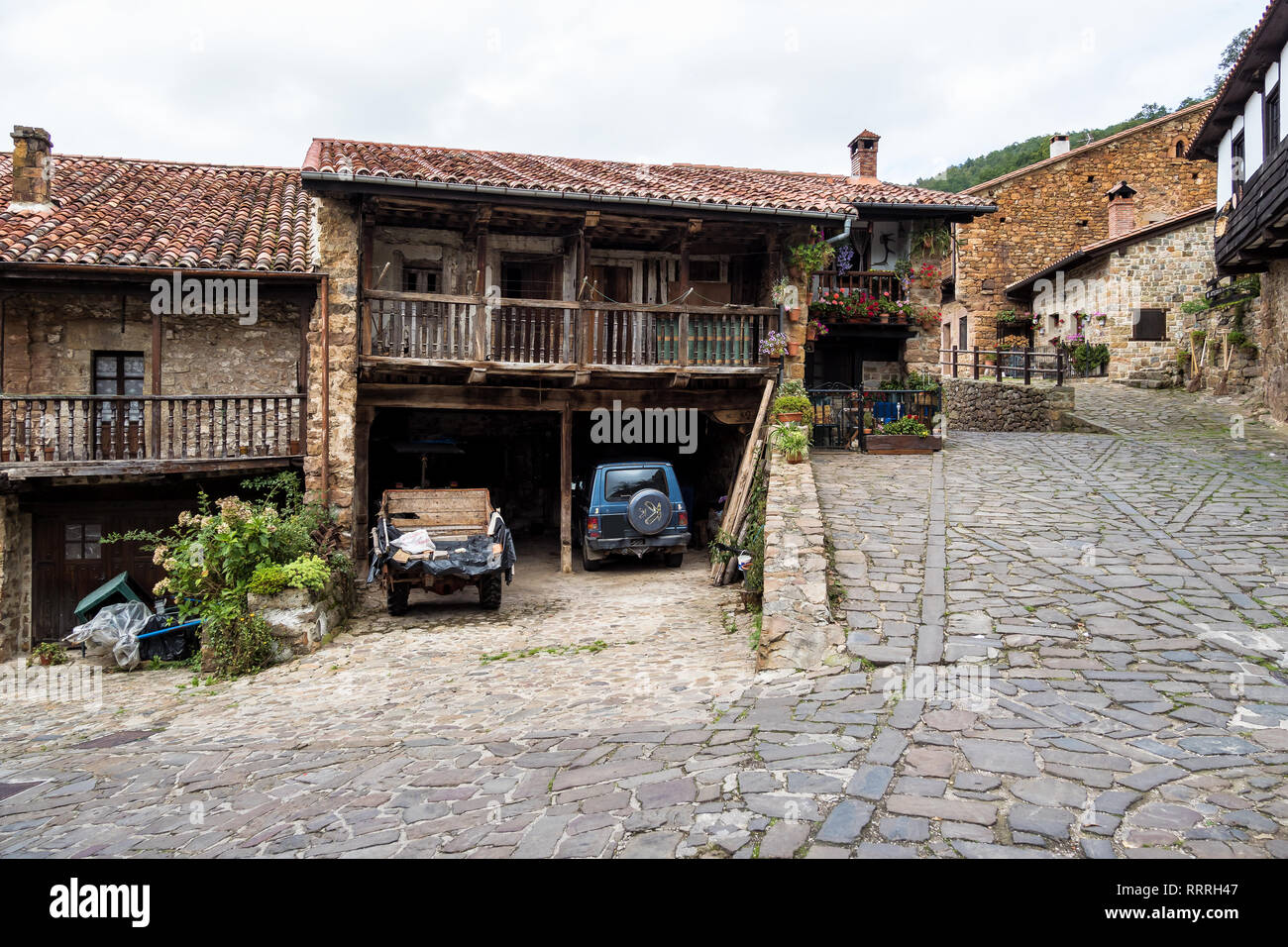 Barcena Mayor, Cabuerniga valley, with typical stone houses is one of ...
