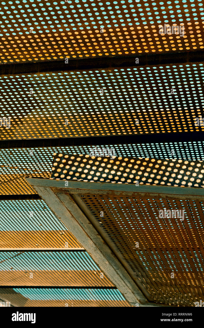 Perforated metal structures on a sunny day Stock Photo - Alamy