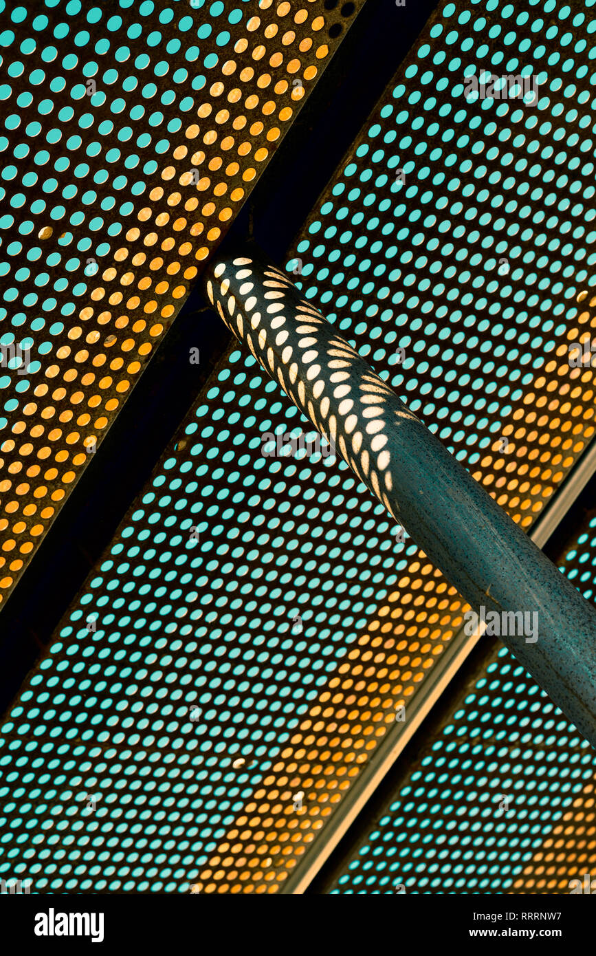 Perforated metal structures on a sunny day Stock Photo - Alamy