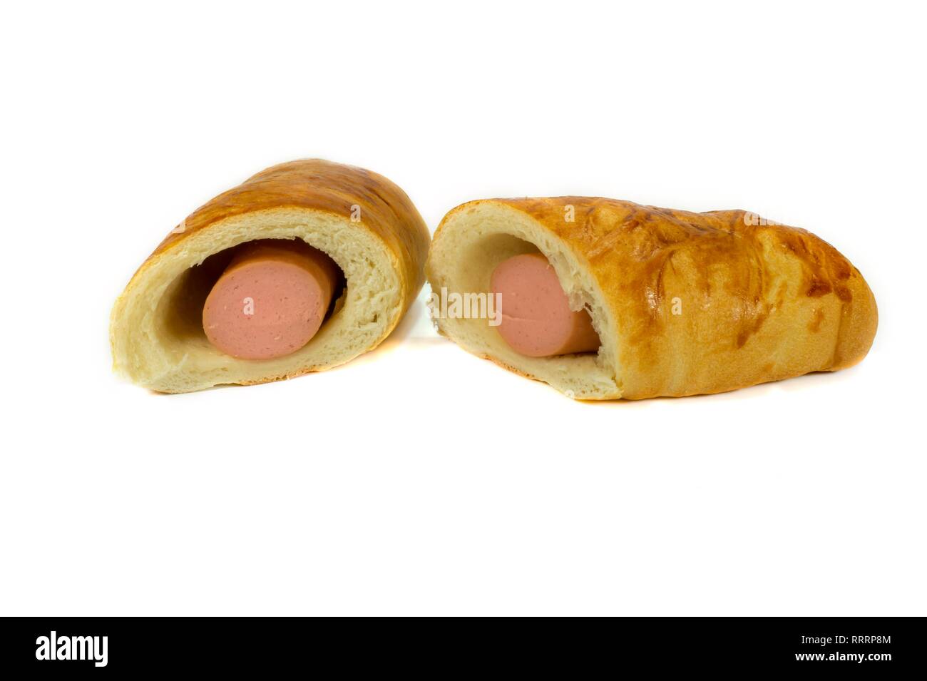 Sausage roll cut in half isolated on a white background Stock Photo - Alamy