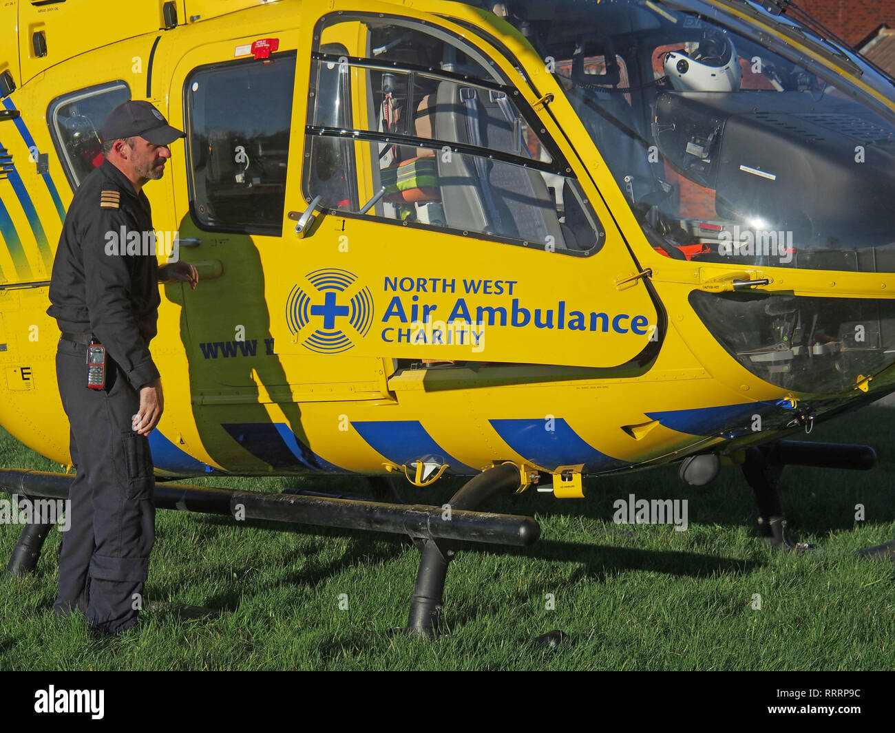 Pilot stands by helicopter Stock Photo - Alamy