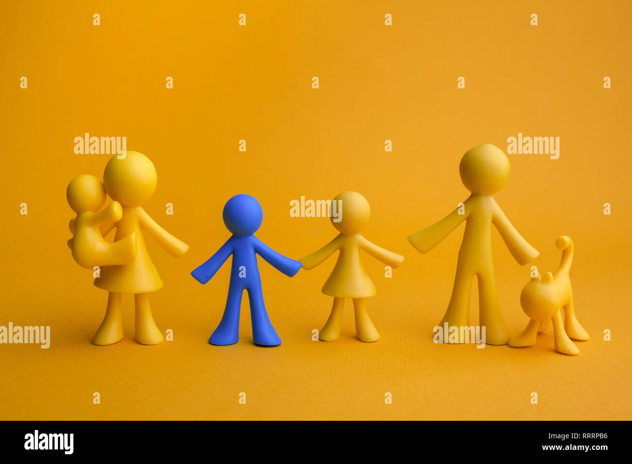 Doll family design with one different kid on yellow background. Autism ...