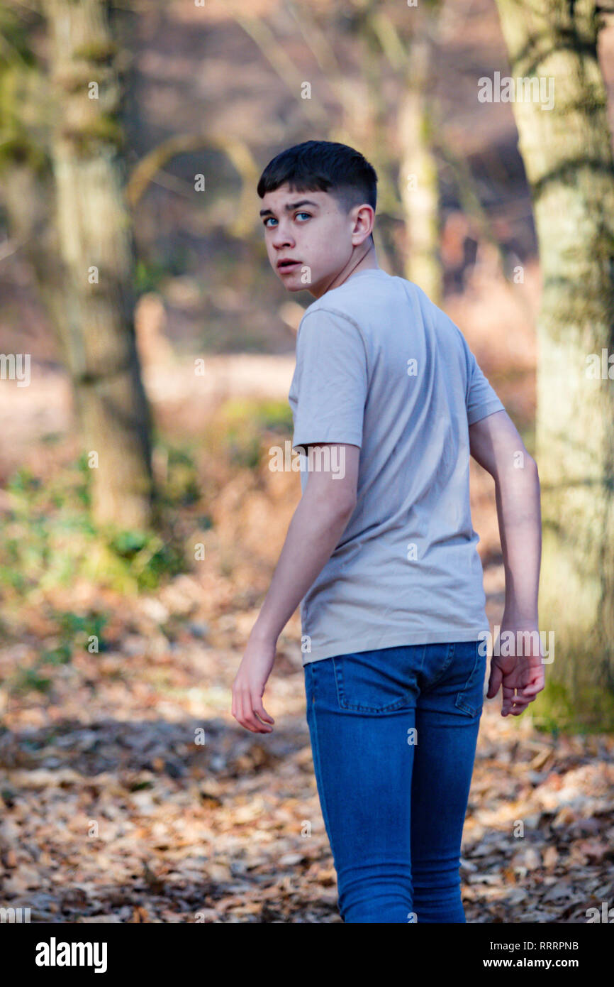 Man Looking Over Shoulder Worried