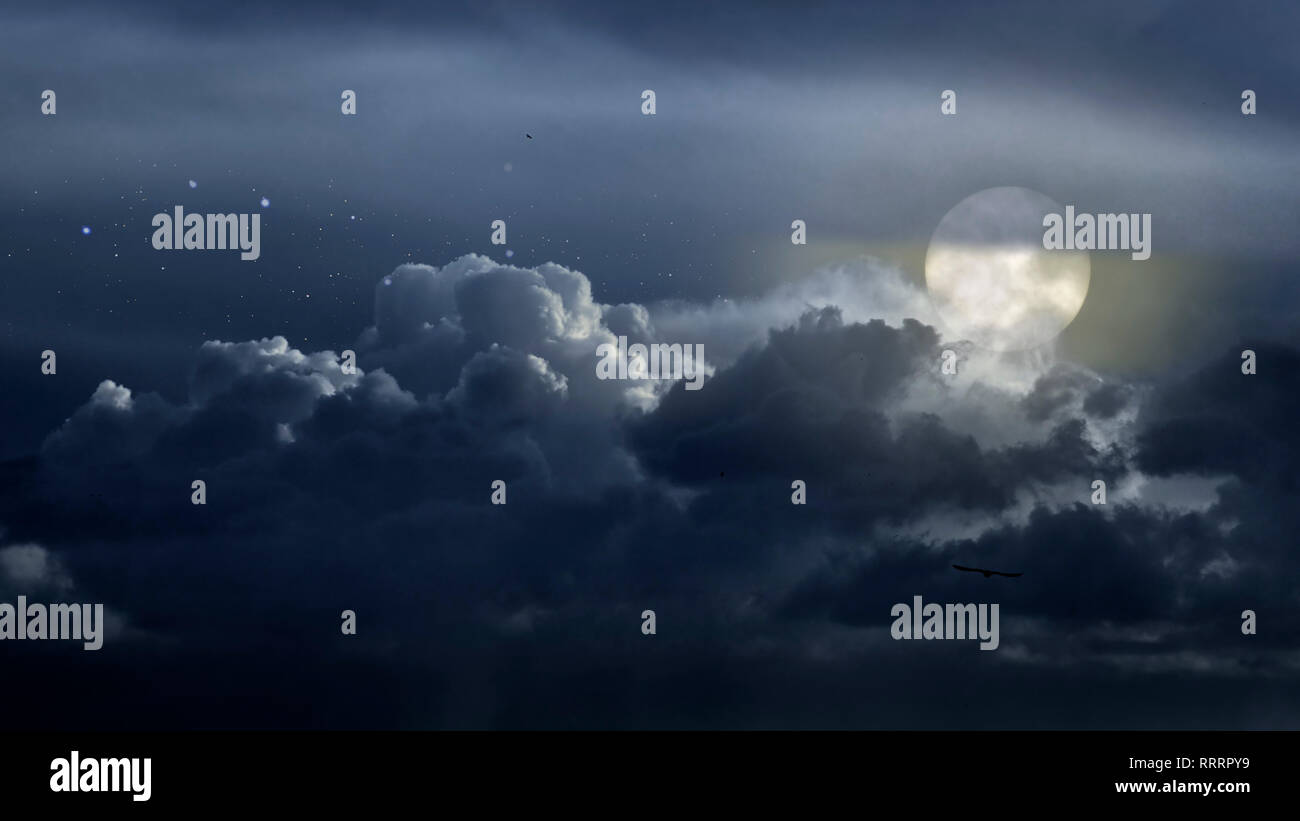 Overcast full moon night sky Stock Photo - Alamy