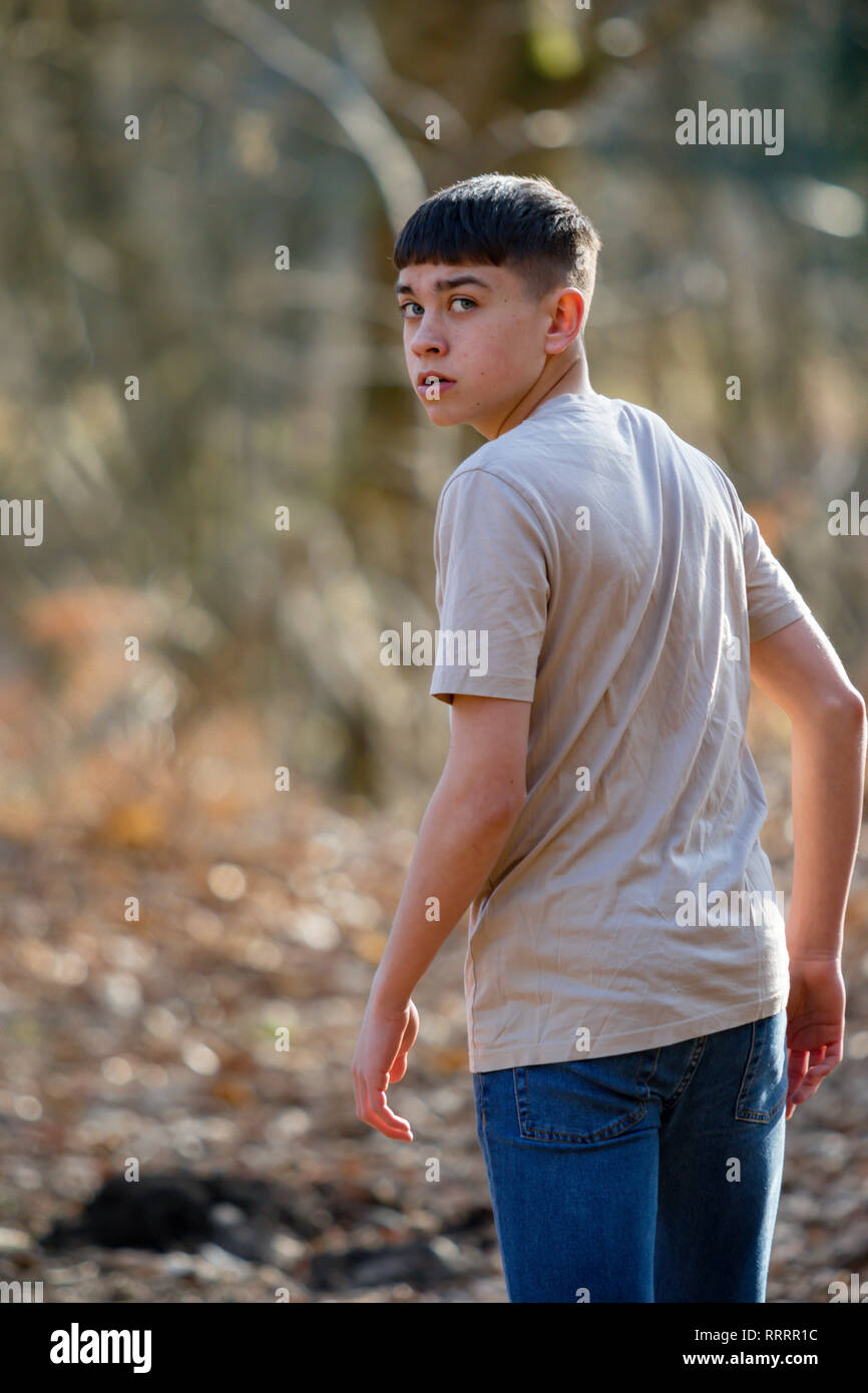 Teen boy walking scared hi-res stock photography and images - Alamy