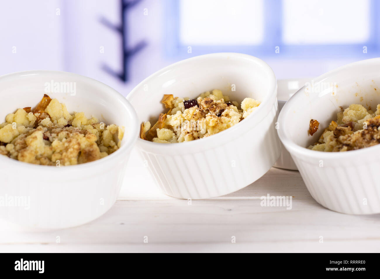 Recipe step by step crumble with fruits three servings in a ceramic ...