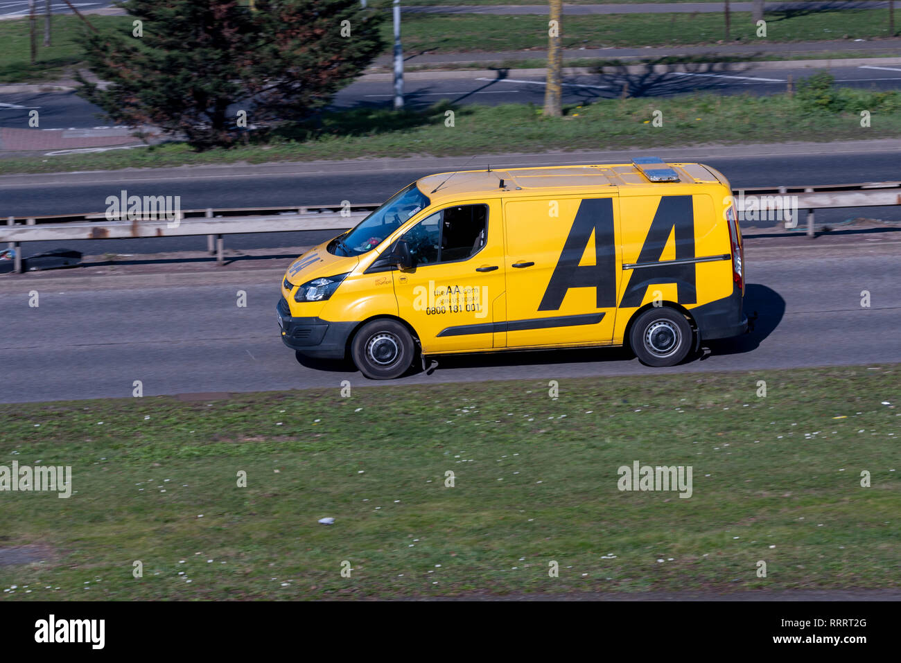 AA van driving on the road. Automobile Association breakdown vehicle ...