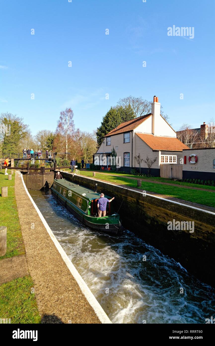 A narrow boat passing through the Thames lock which connects the River ...