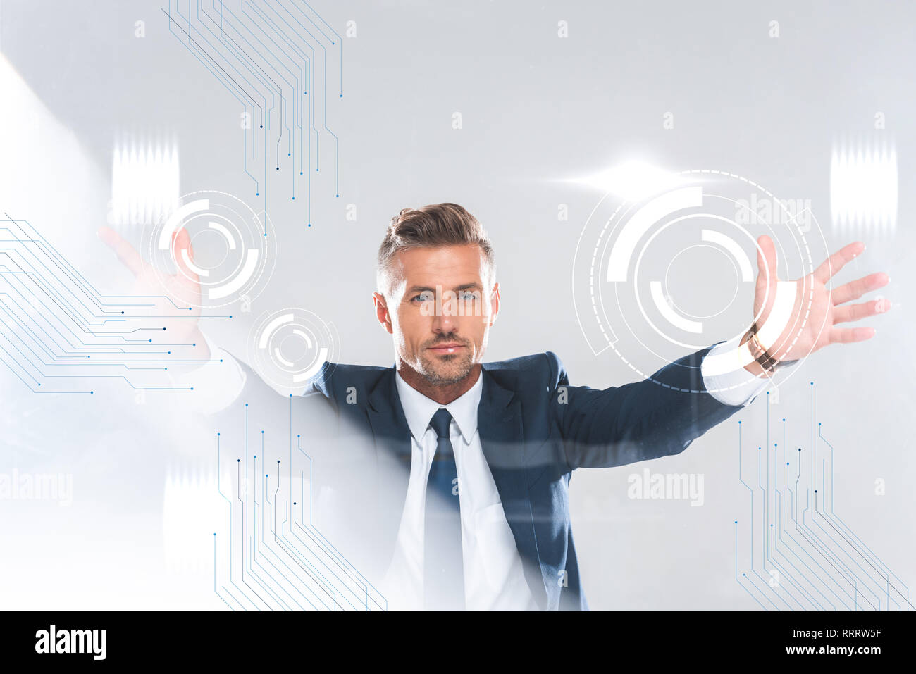 handsome businessman holding innovation technology isolated on white ...