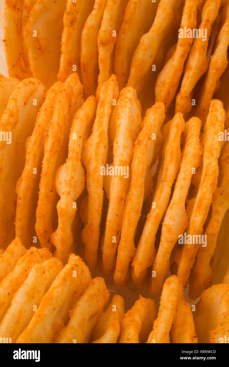 Cheddar cheese rice crackers in a clear plastic packaging tray Stock ...