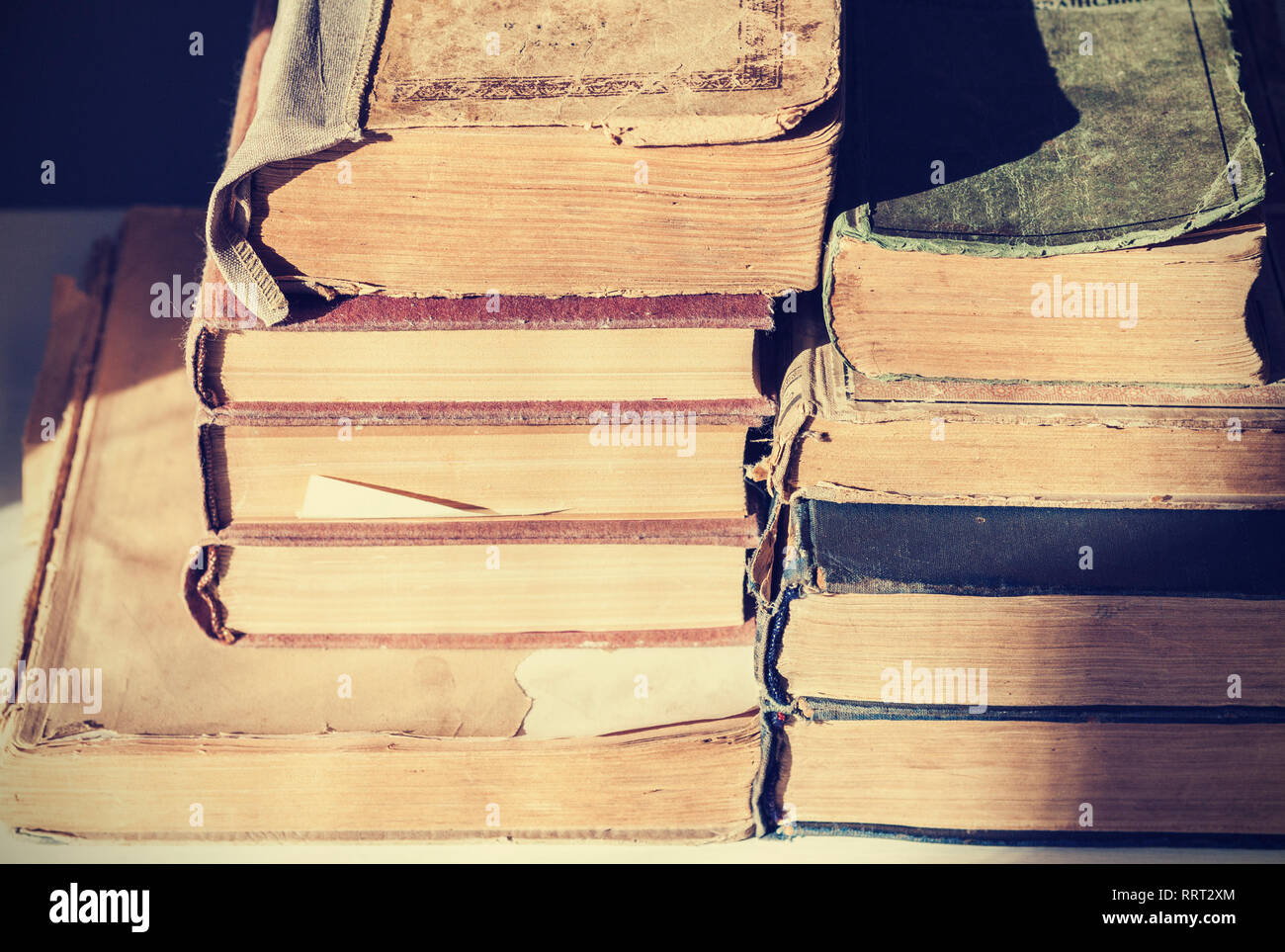 Stack of old books education retro concept background, many books piles ...