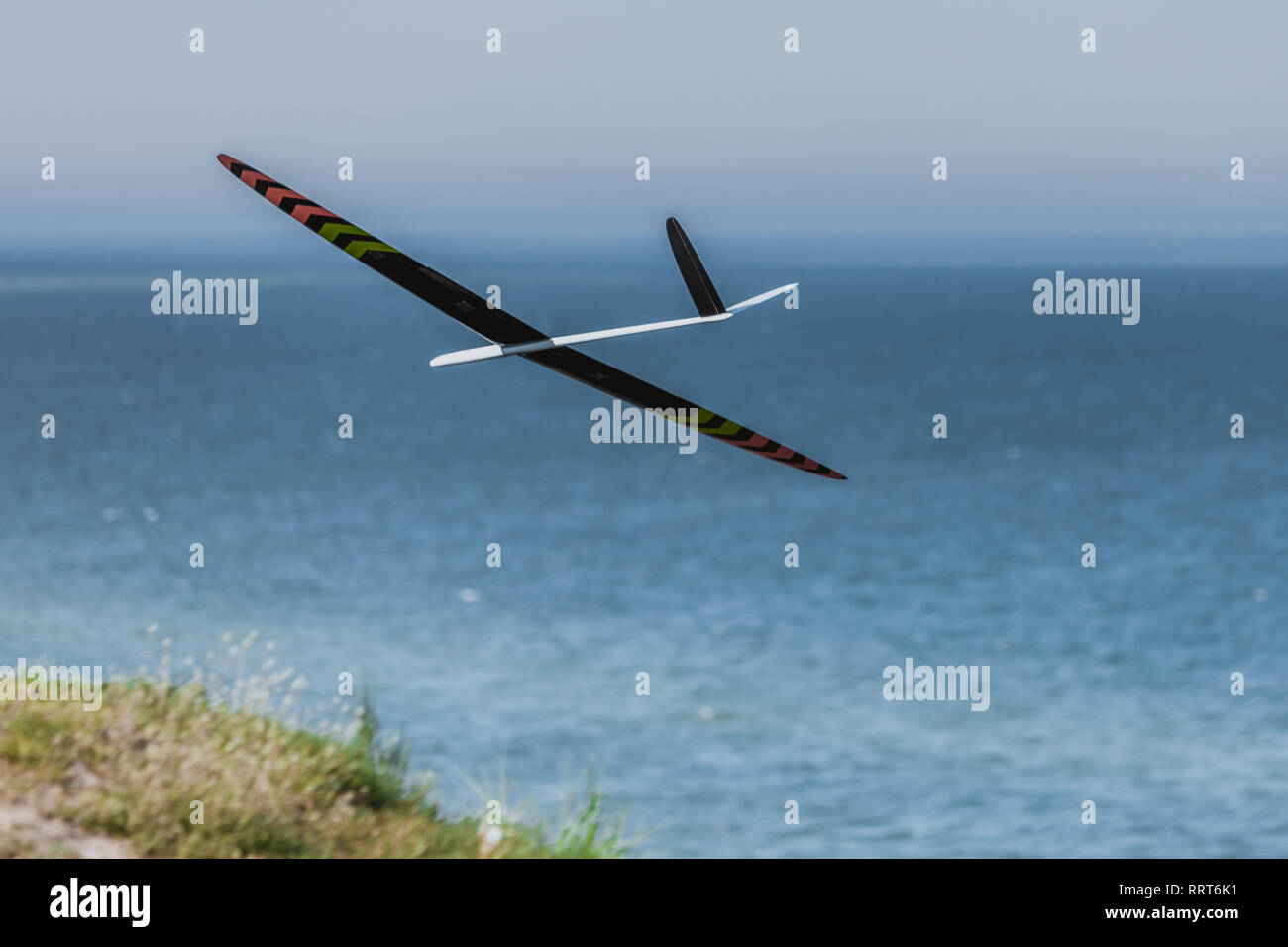 RC remotely controlled soaring plane model sailplane on blue sky in ...
