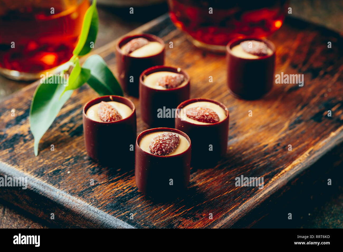Glass transparent teapot and two glass cups with black tea with ...