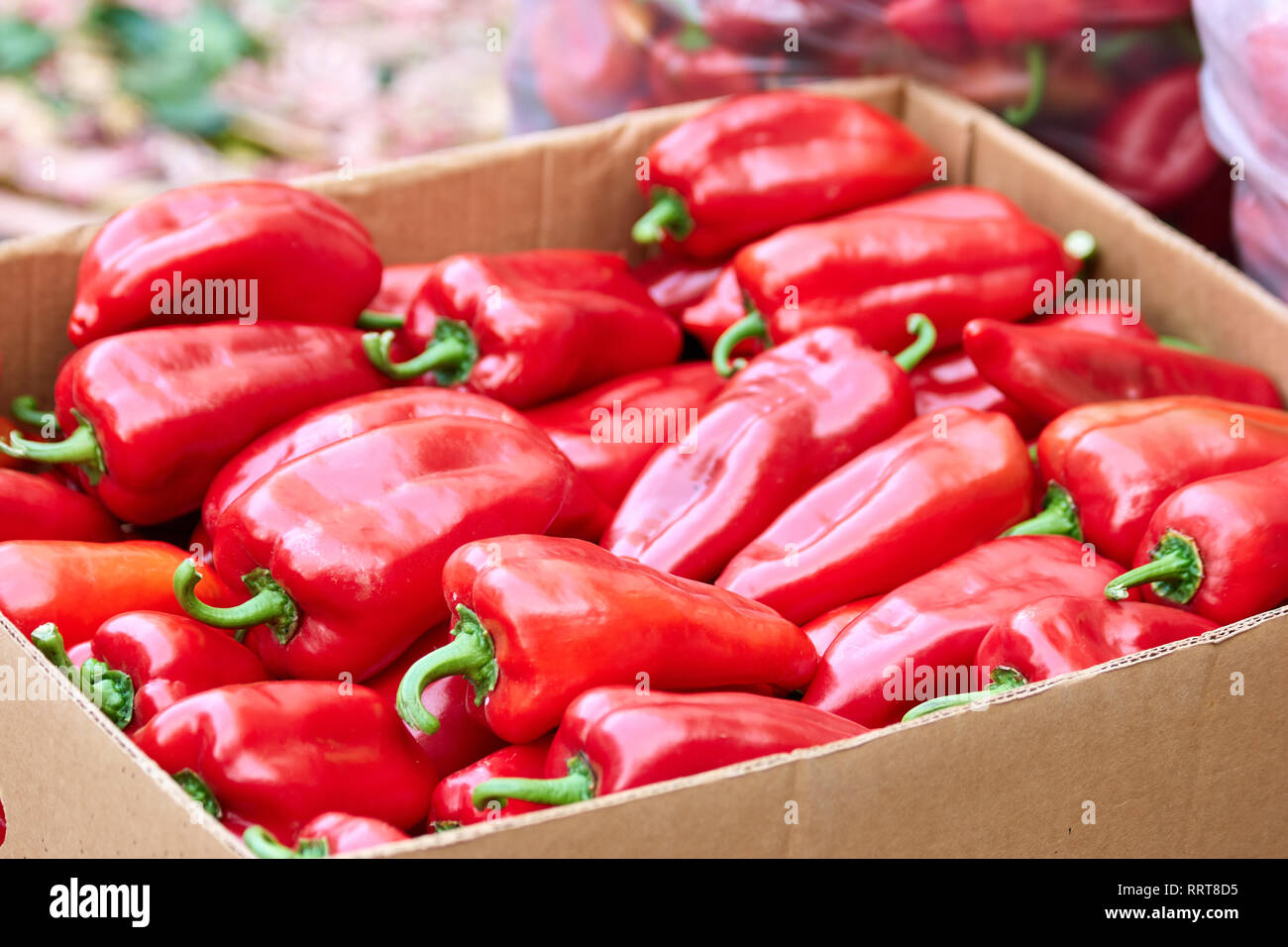 Cardboard box with red bell peppers Stock Photo - Alamy