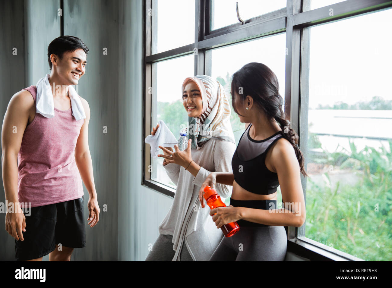 sport people talking to each other after exercising Stock Photo - Alamy