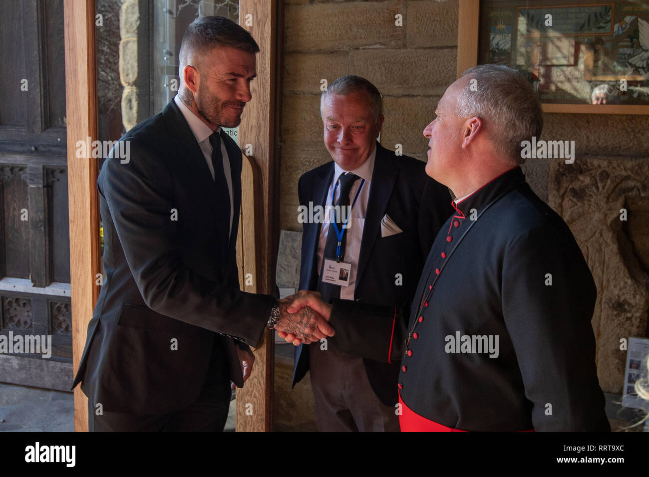 David Beckham is greeted as he arrives at Halifax Minster for the ...