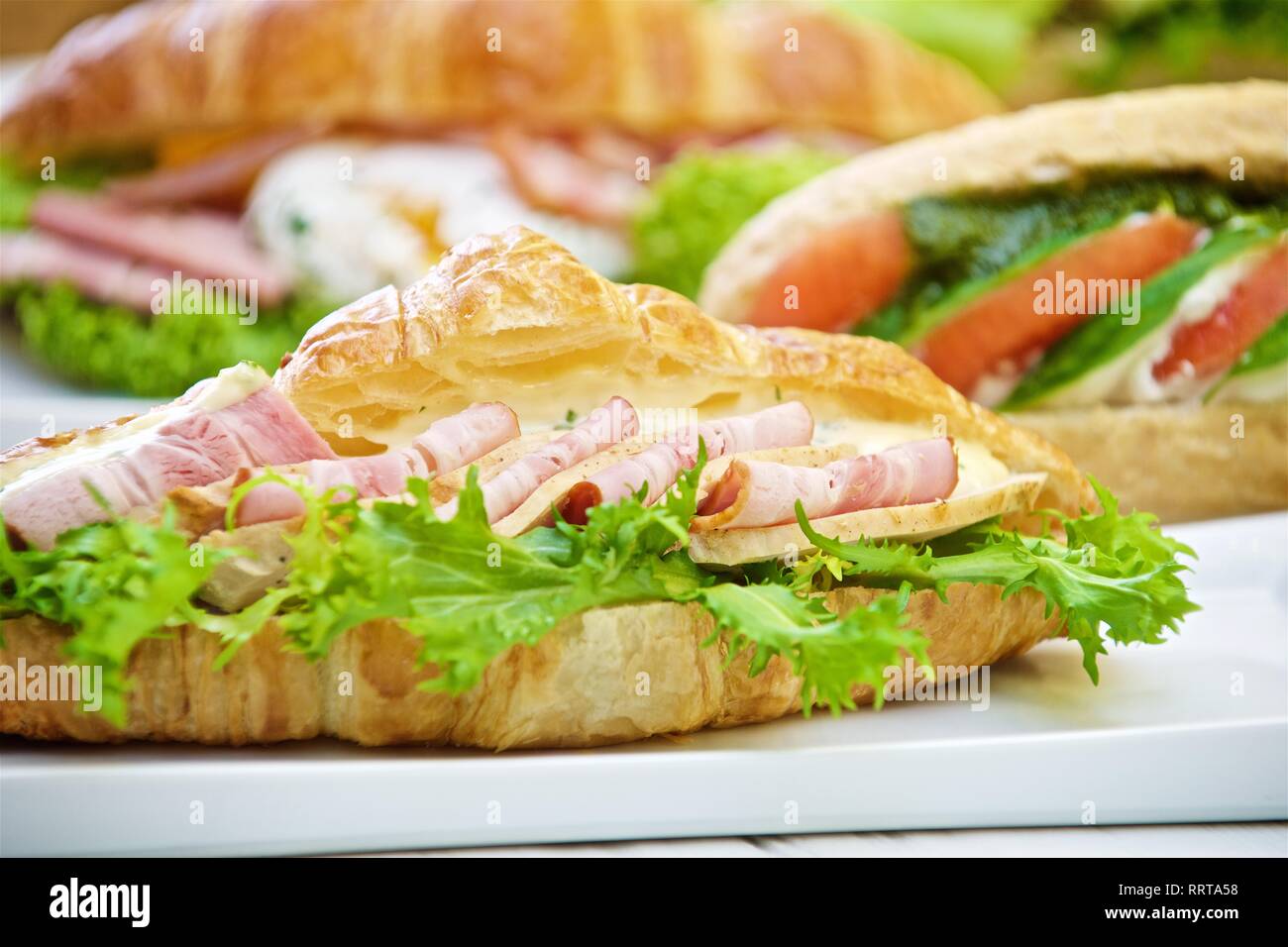 delicious sandwiches with different fillings Stock Photo - Alamy
