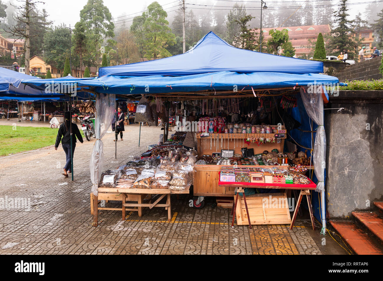A market stall with gifts, souvenirs and trinkets on display for sale ...