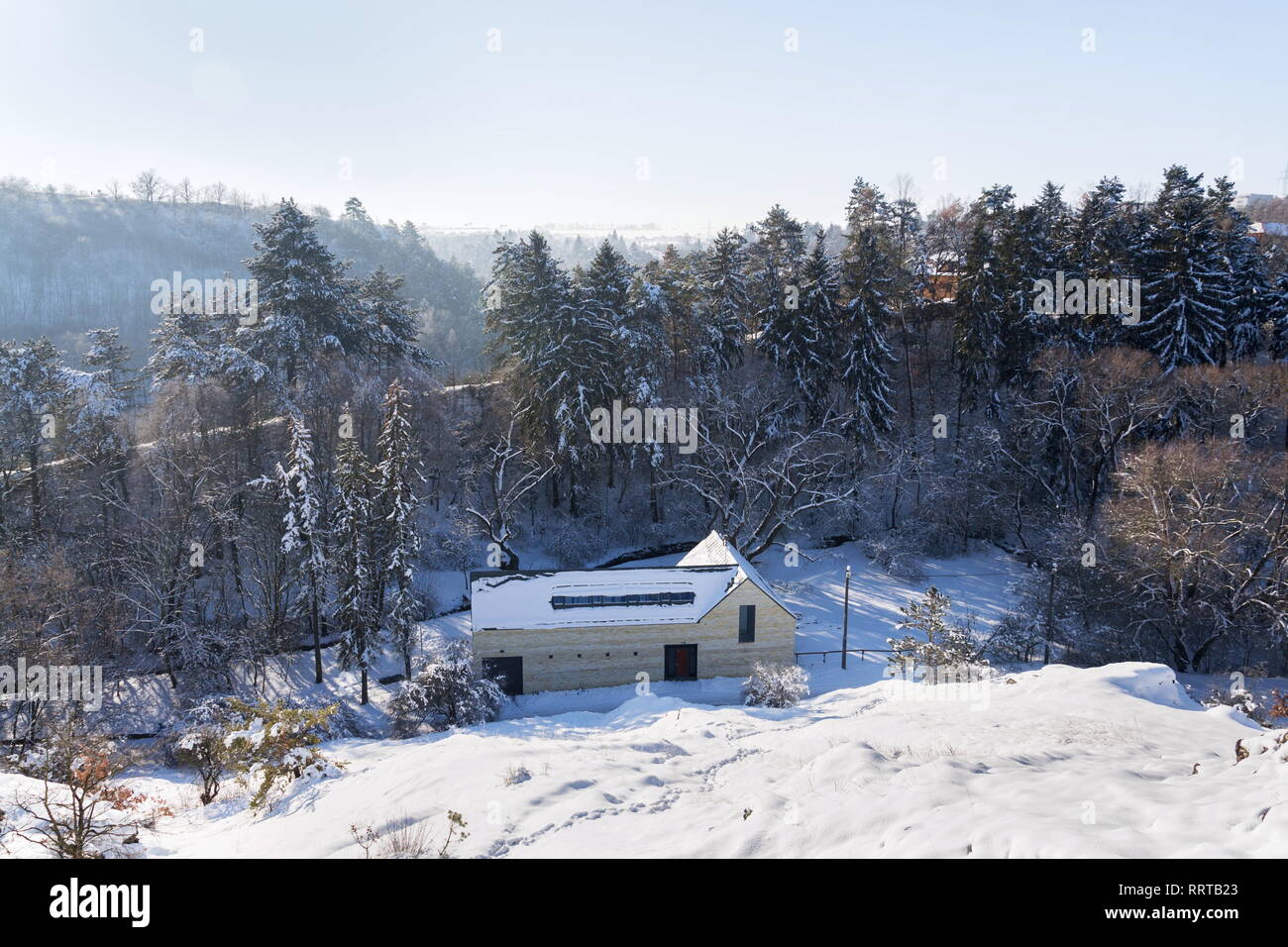 New modern dream house apartments in snowy valley on sunny freezing ...