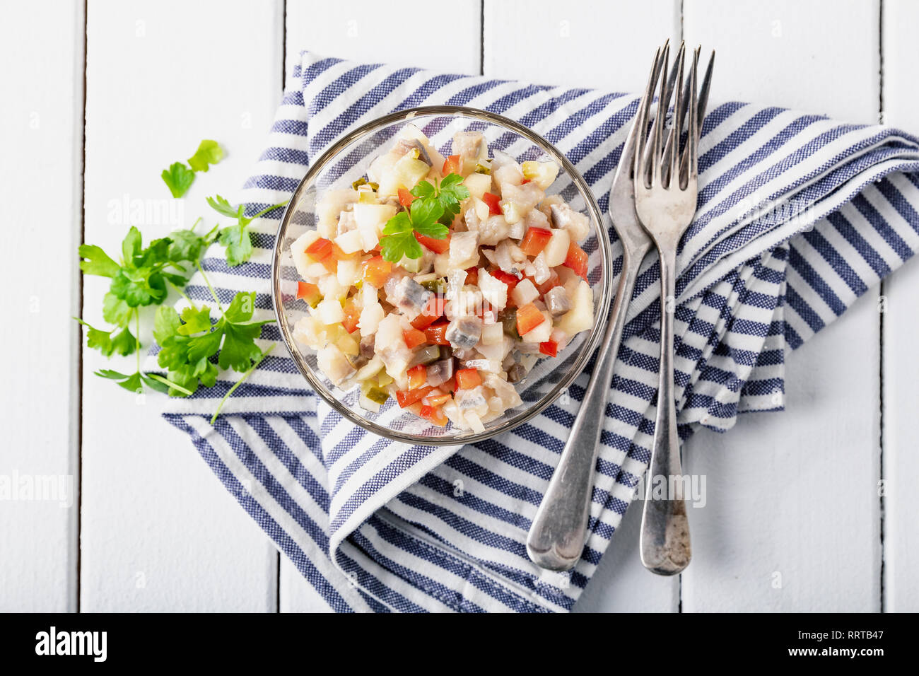 homemade herring salad with fresh onions apple red paprika and herbs ...