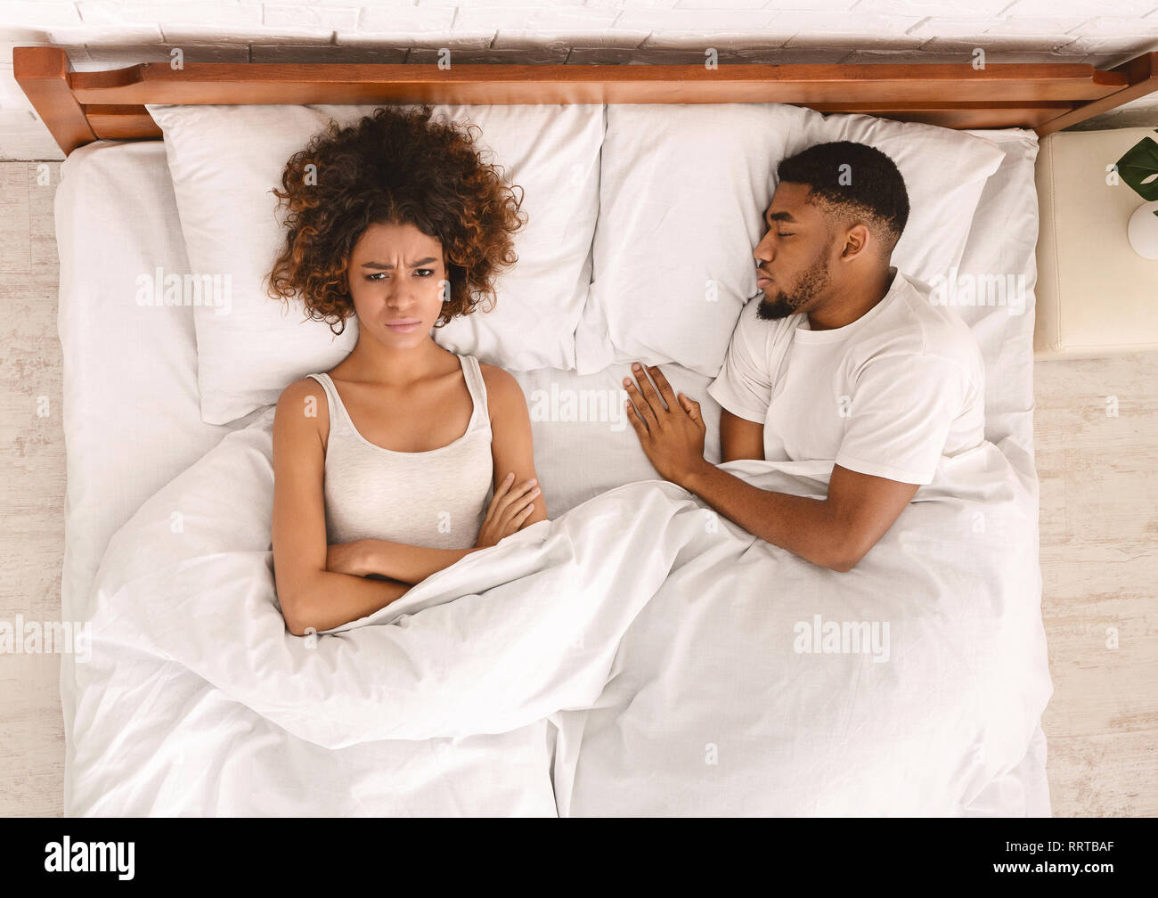 Couple Sad Bed High Resolution Stock Photography and Images - Alamy