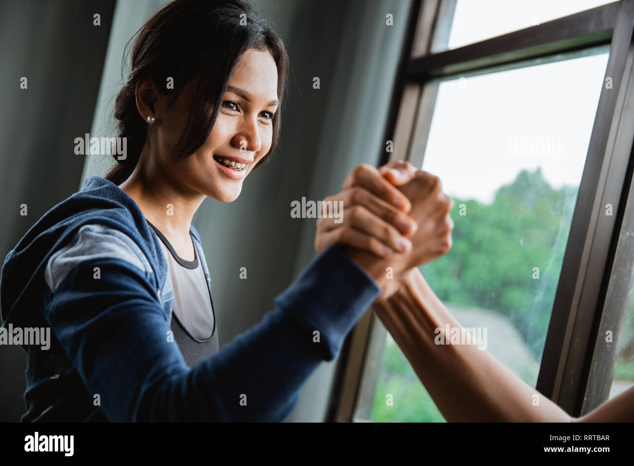 gesture of sport shake hand in the gym Stock Photo - Alamy