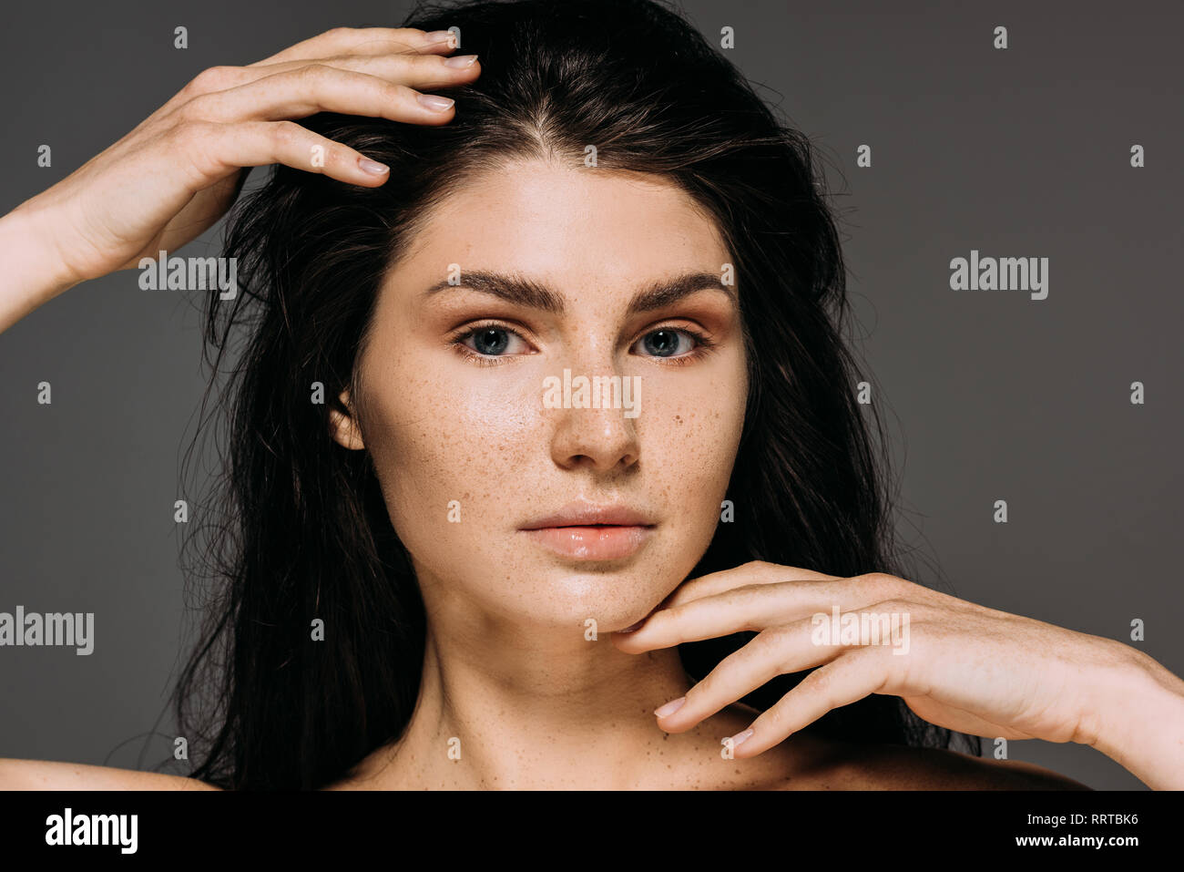 Portrait of attractive tender girl with freckles on face isolated on ...