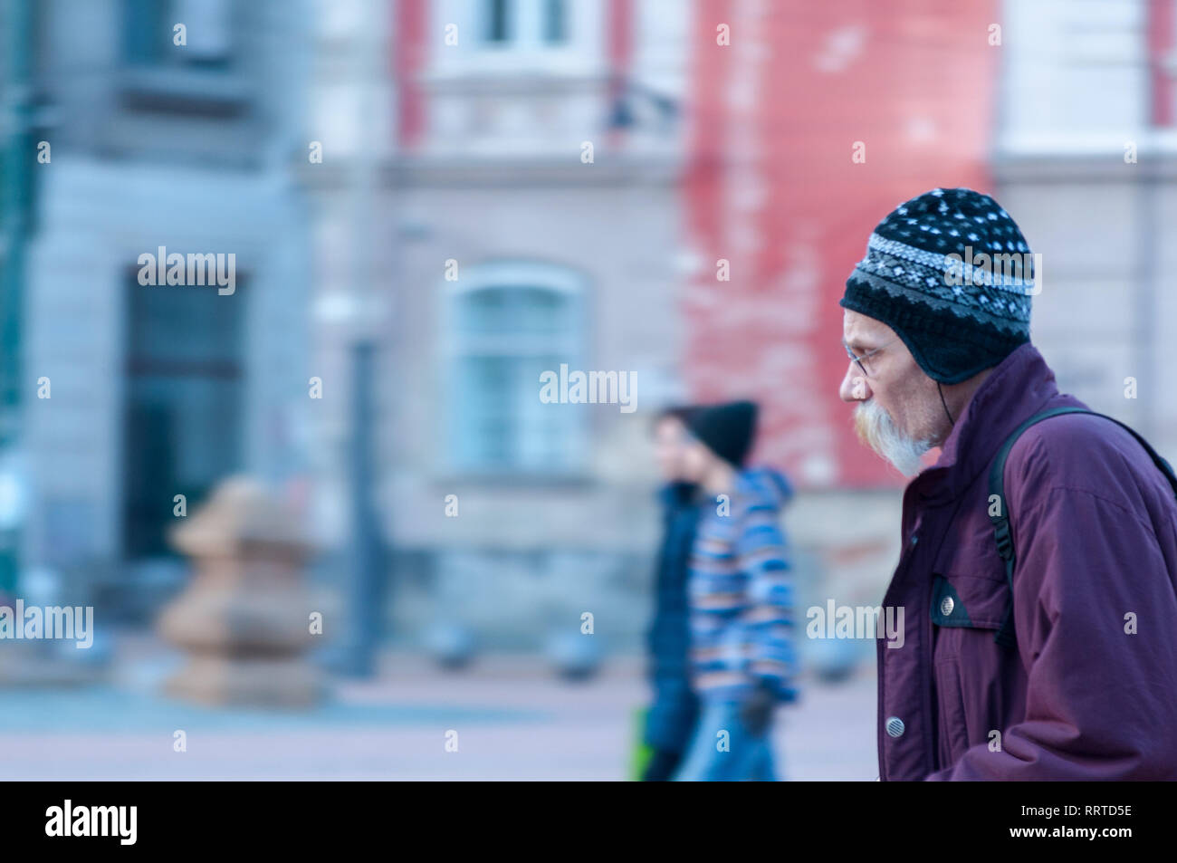 TIMISOARA, ROMANIA - FEBRUARY 05, 2016: Man walking on the street ...