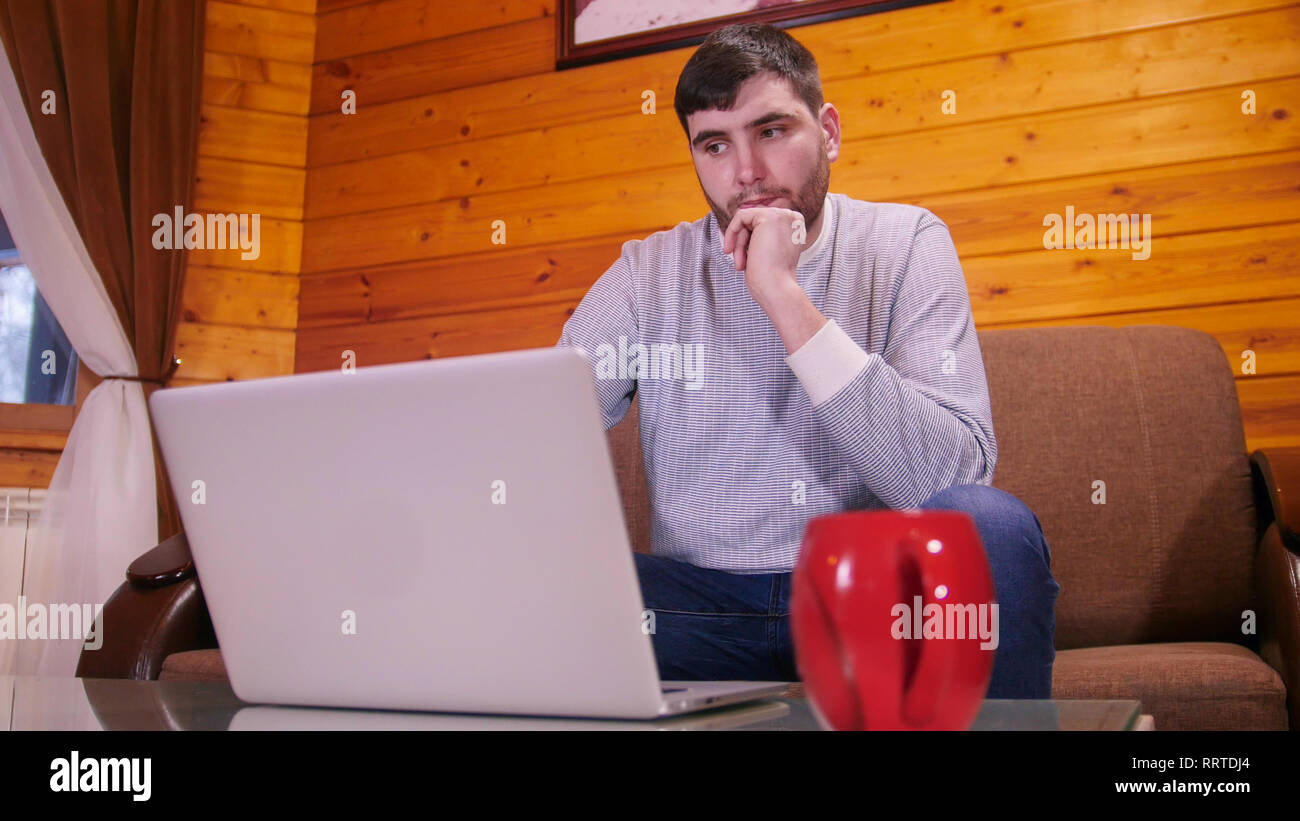 Puzzled freelancer man work hi-res stock photography and images - Alamy