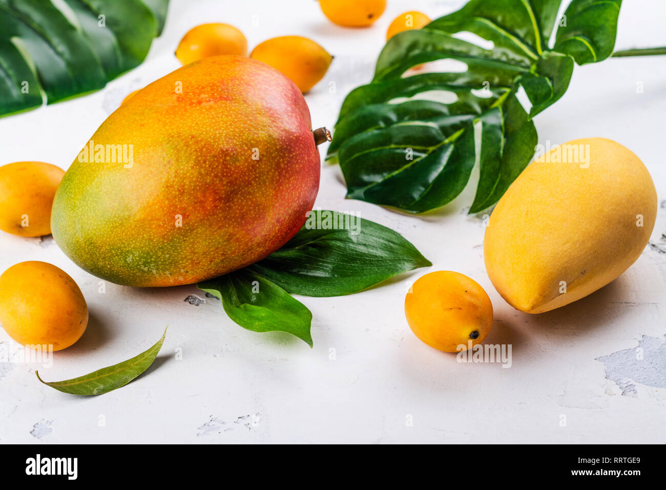 Tropical mango fruits Stock Photo - Alamy