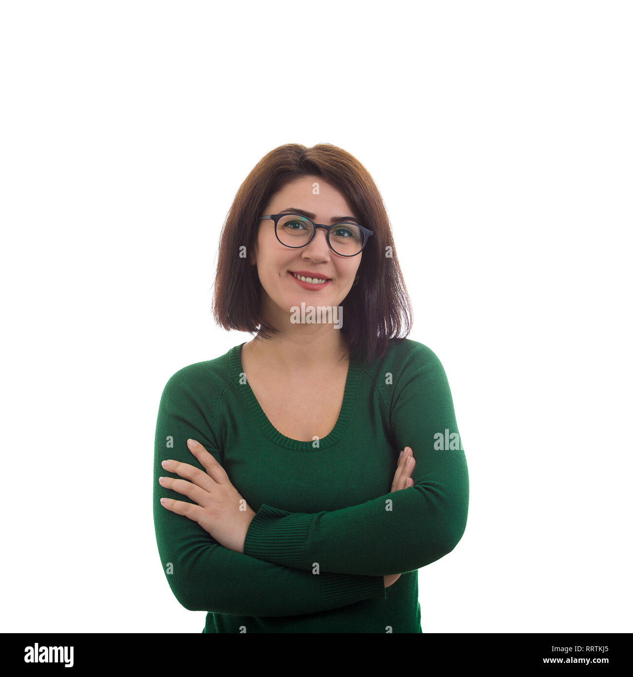 Casual young woman wearing glasses, arms crossed, smiling broadly to ...