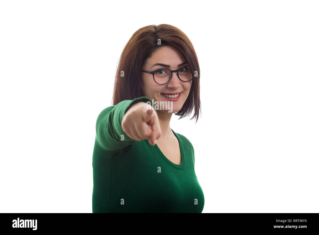 Positive handsome young woman pointing finger to camera isolated over ...
