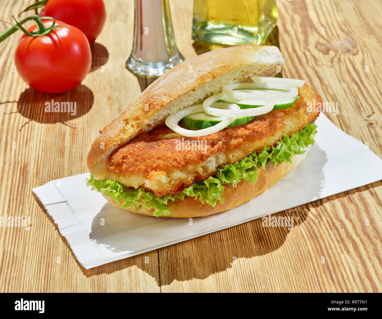 Baked Fish in a Bun - Outdoor in Summertime Stock Photo - Alamy