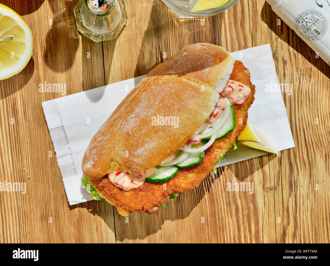 Baked Fish in a Bun - Outdoor in Summertime Stock Photo - Alamy