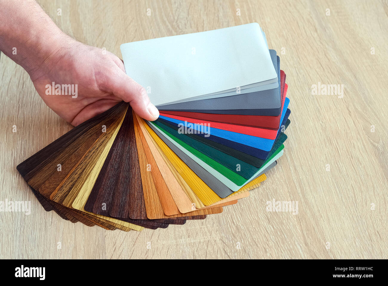 Lamination samples. On a wooden background for lamination of any wooden ...
