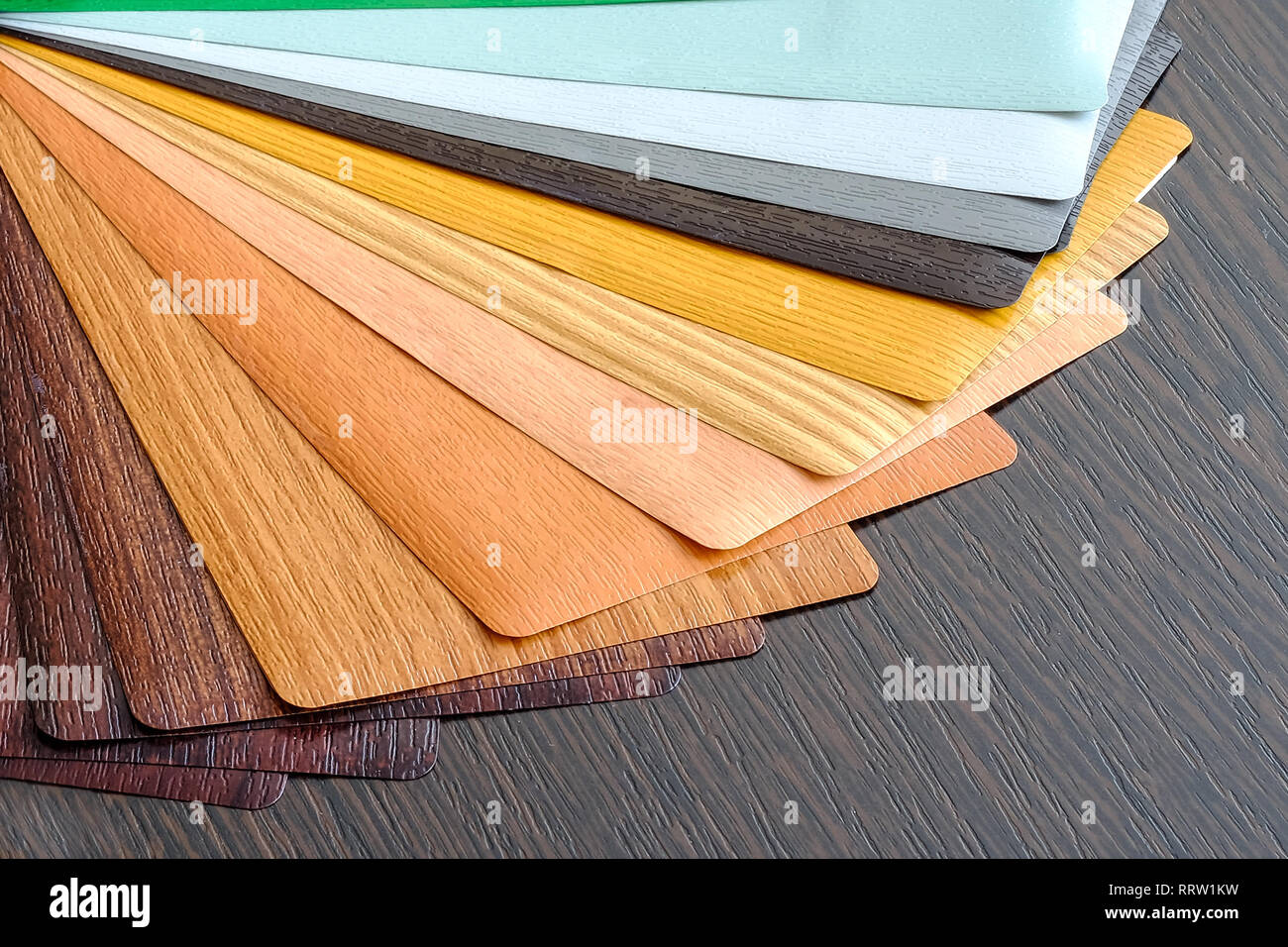 Lamination samples. On a wooden background for lamination of any wooden ...