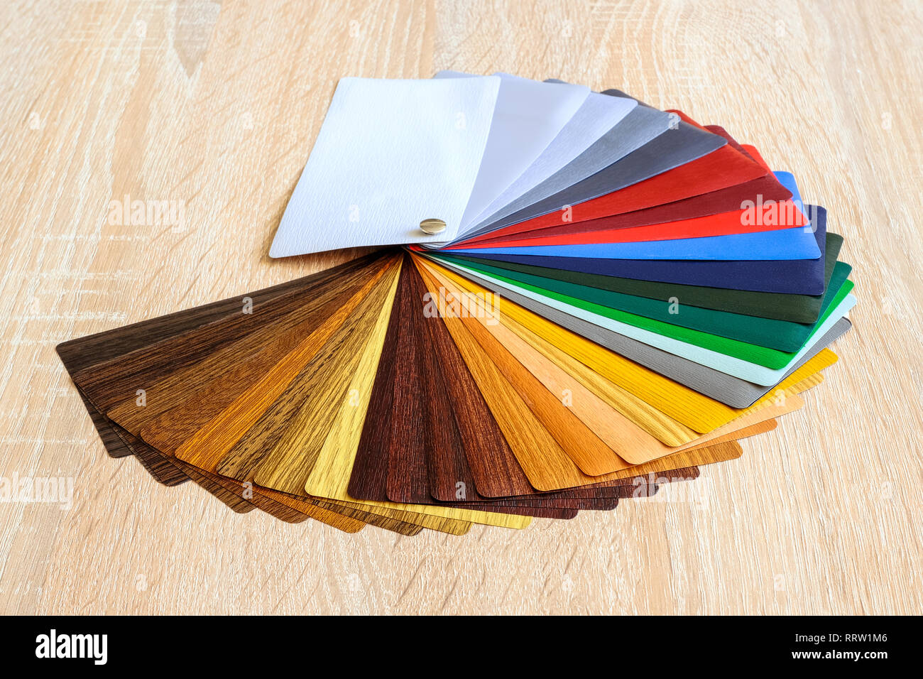 Lamination samples. On a wooden background for lamination of any wooden ...