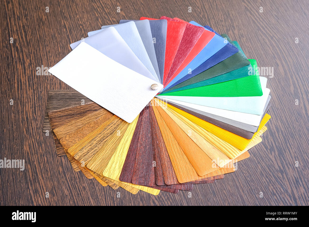 Lamination samples. On a wooden background for lamination of any wooden ...