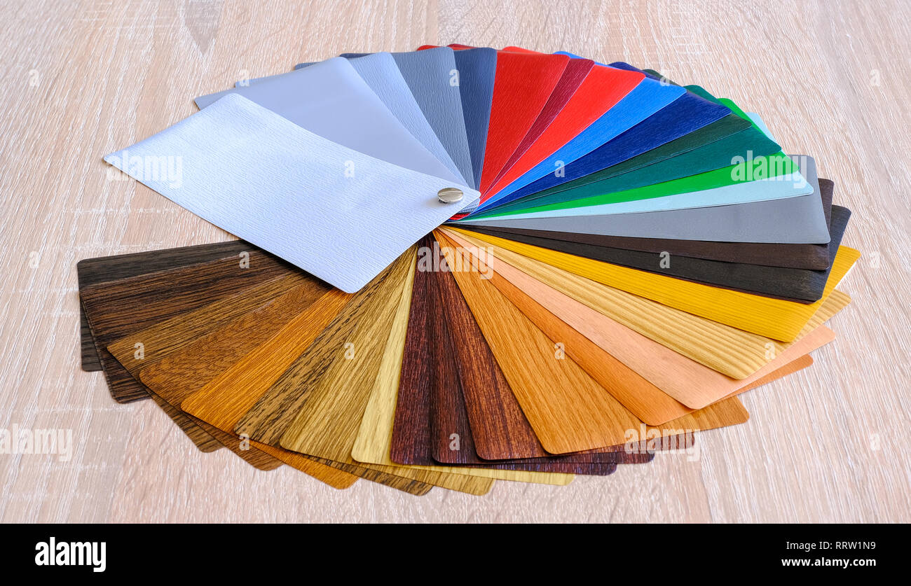 Lamination samples. On a wooden background for lamination of any wooden ...