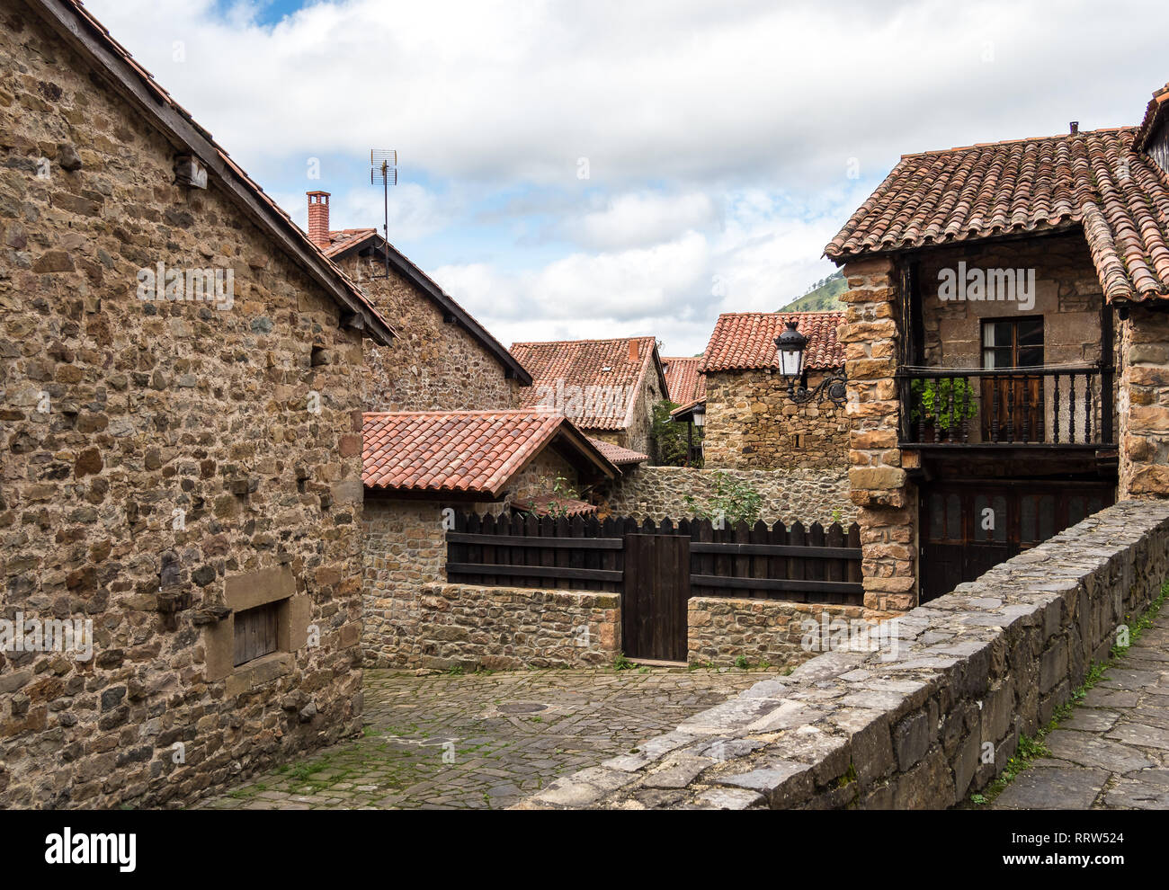Barcena Mayor, Cabuerniga valley, with typical stone houses is one of ...