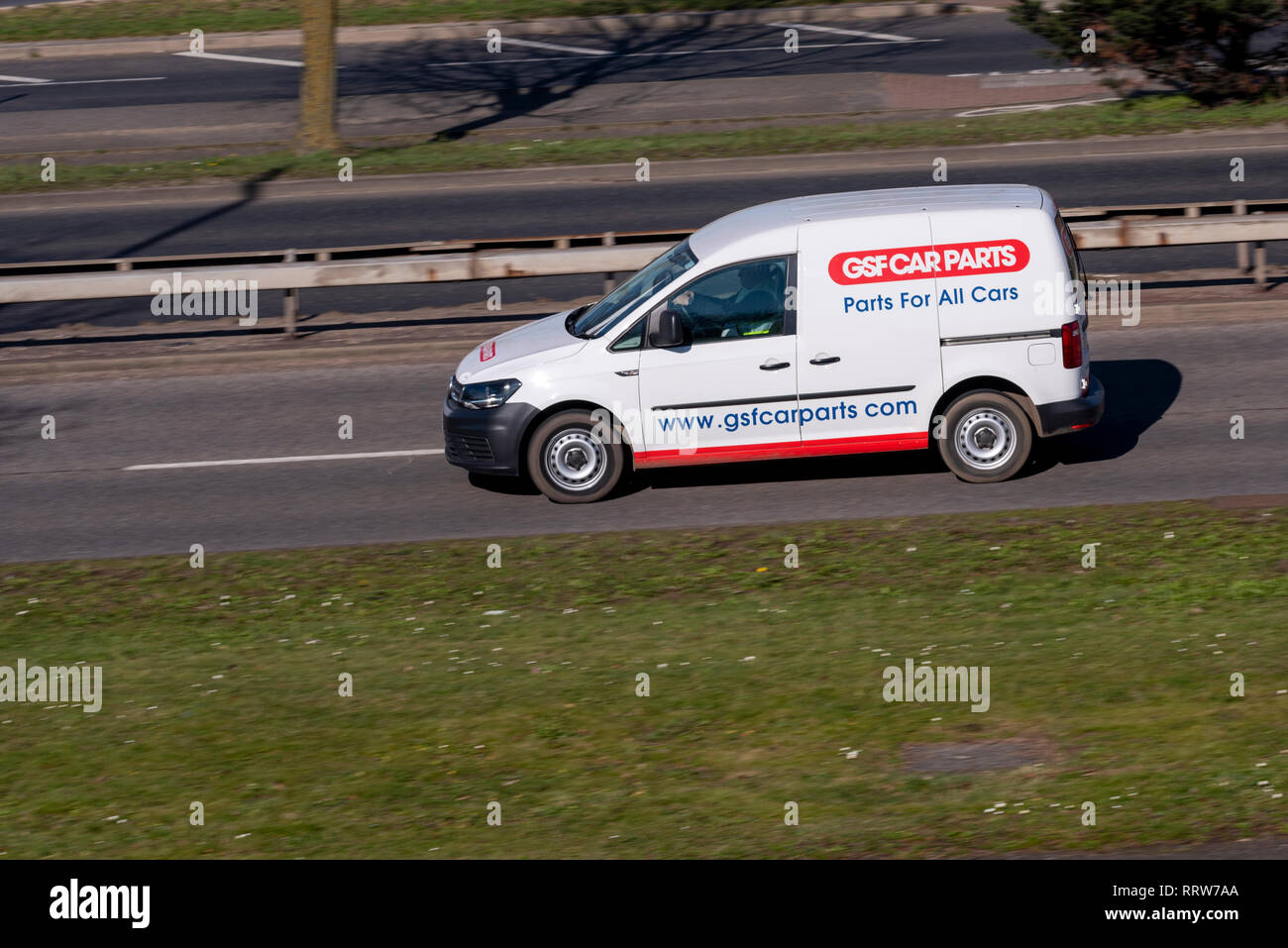GSF Car Parts delivery van driving on the road. Parts for all cars, van ...