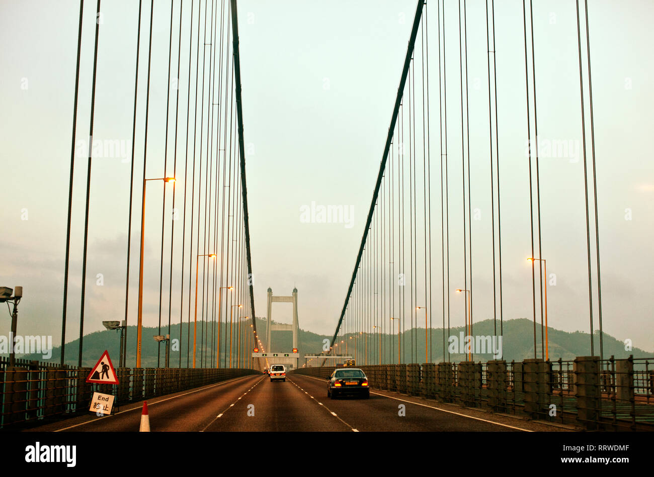 Traffic traveling along a suspension bridge Stock Photo - Alamy