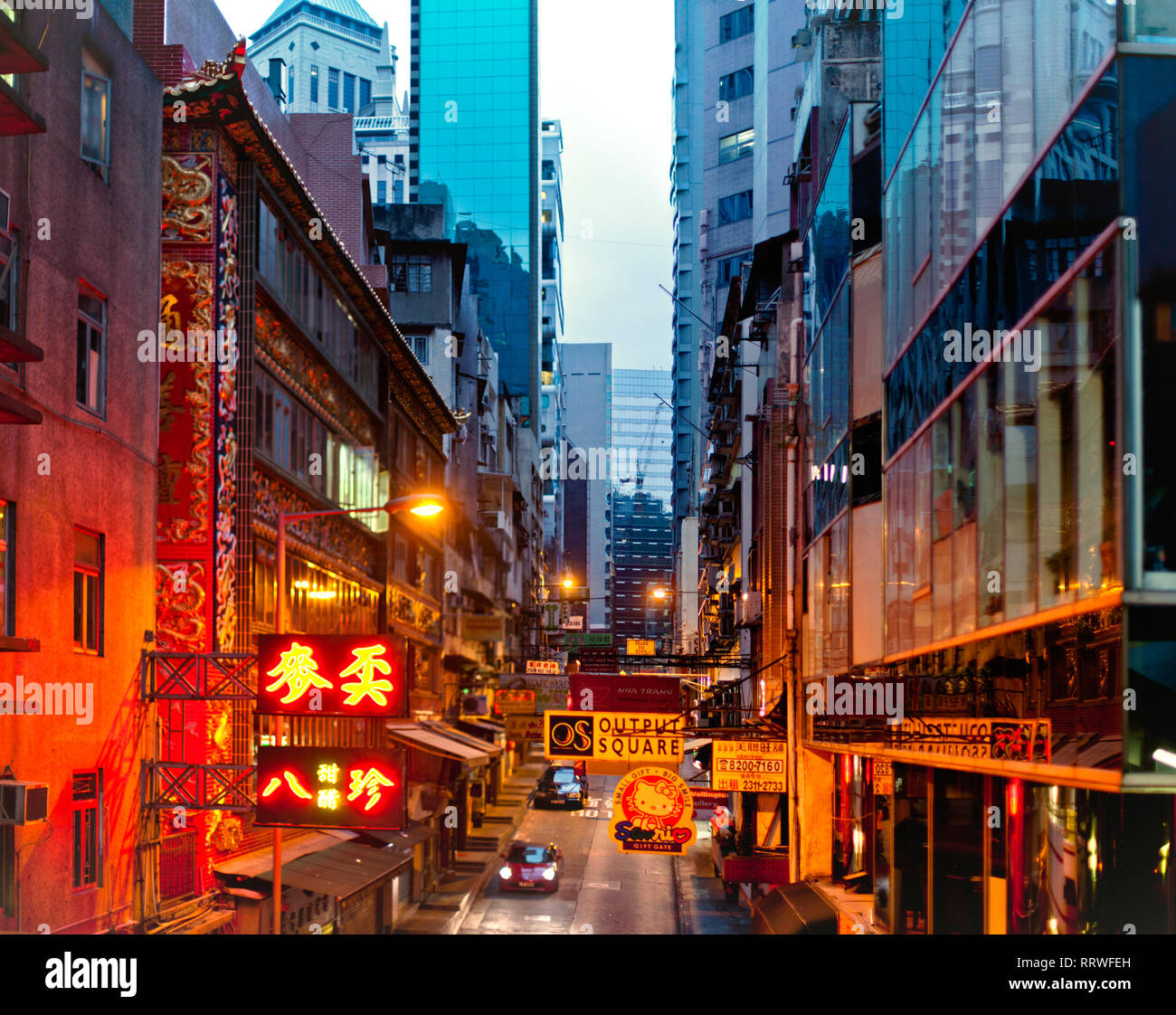 Neon signs on buildings in an urban city at night Stock Photo - Alamy