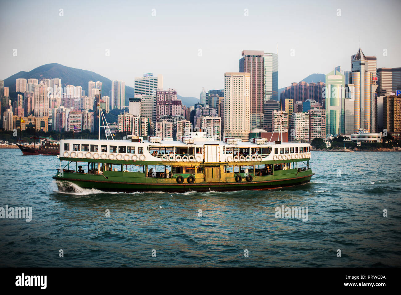 Ferry crossing the harbor of a large city Stock Photo - Alamy