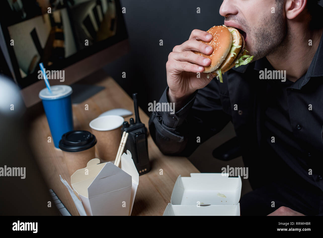 Asian person eating burger hi-res stock photography and images - Alamy