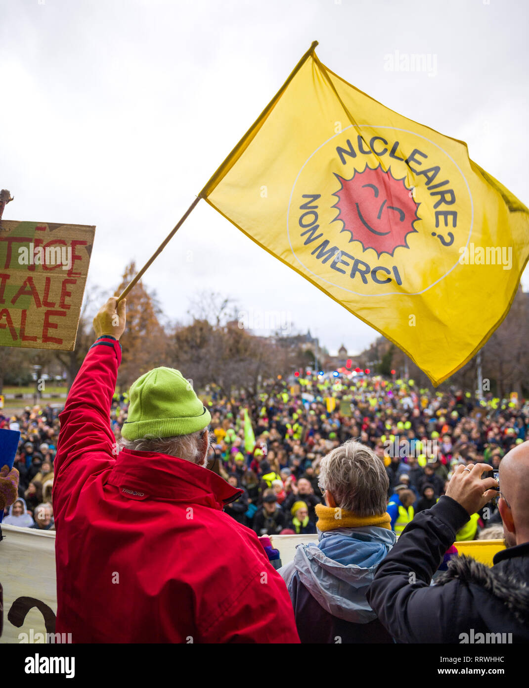 STRASBOURG, FRANCE - DEC 8, 2018: Man with Nuclear no thank you flag ...