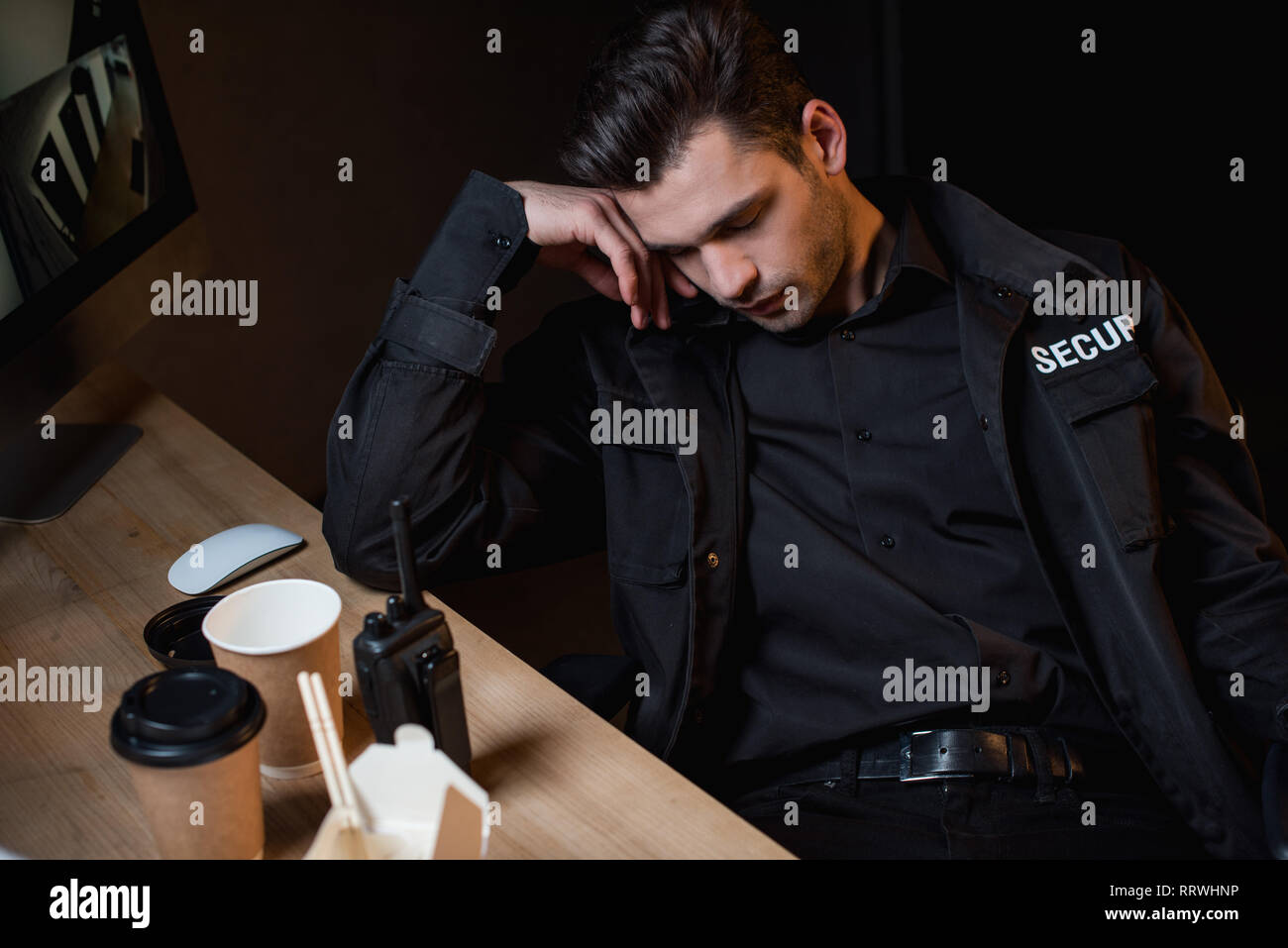 Sleeping security guard hi-res stock photography and images - Alamy
