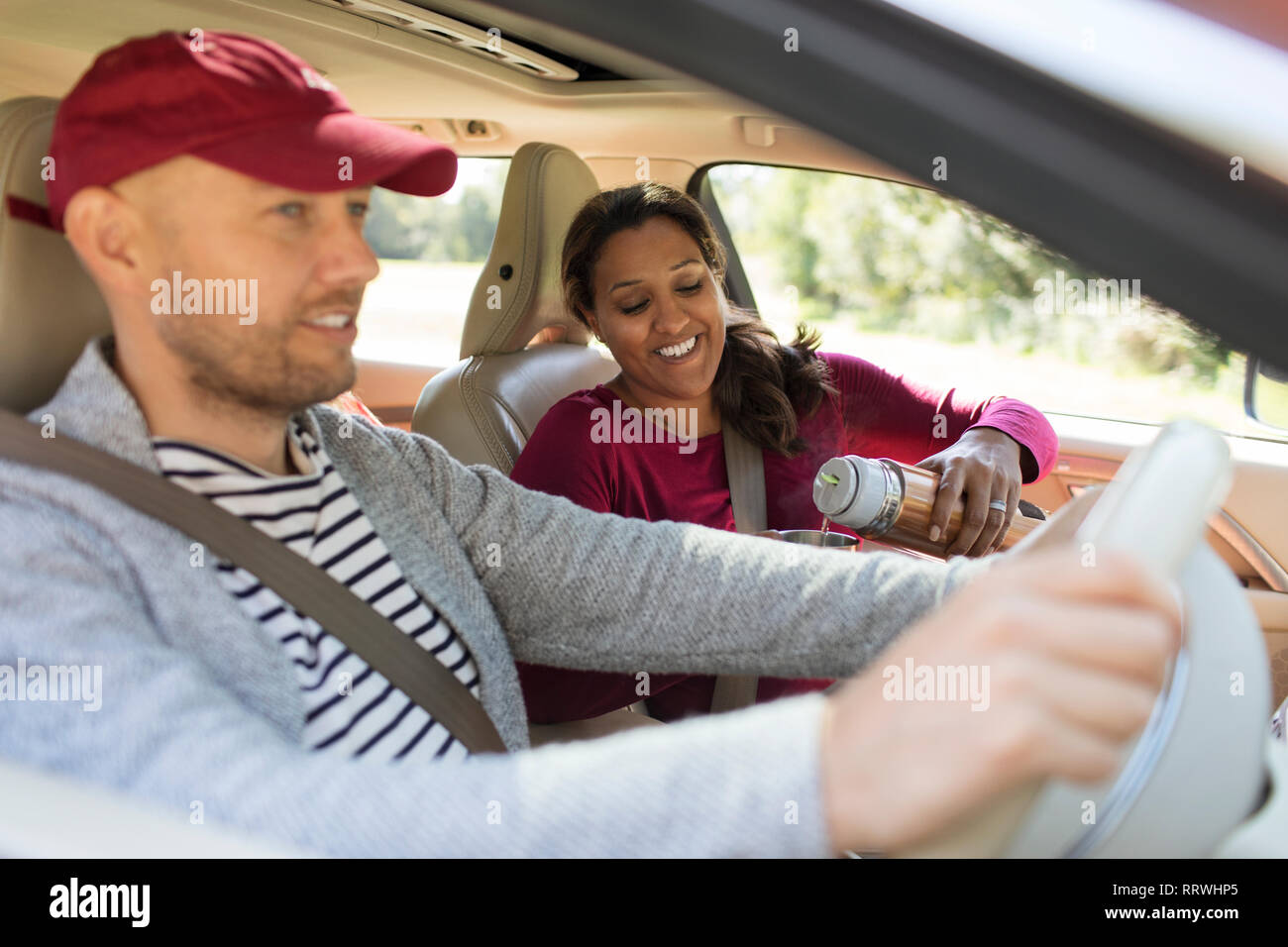 Man drinking coffee driving car hi-res stock photography and images - Alamy