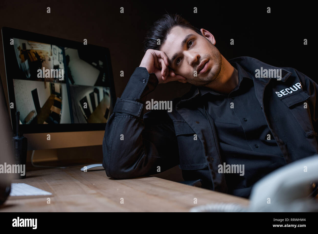 Bored security guard hi-res stock photography and images - Alamy